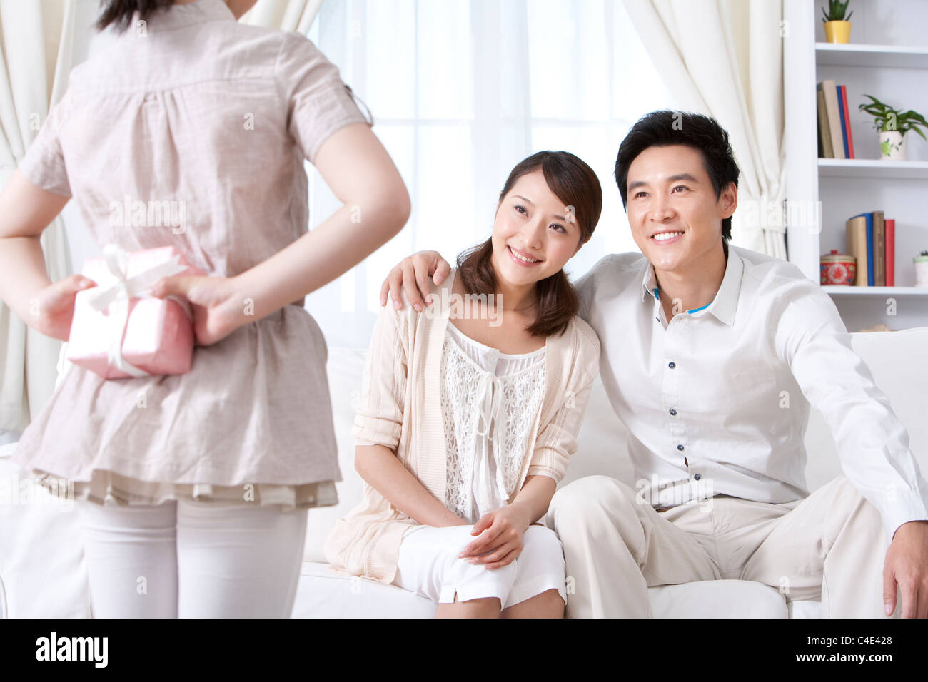 Giving Gifts to Parents Stock Photo - Alamy