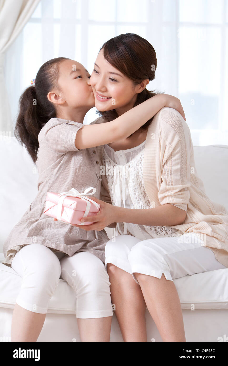 Mother and Daughter Embracing Stock Photo - Alamy