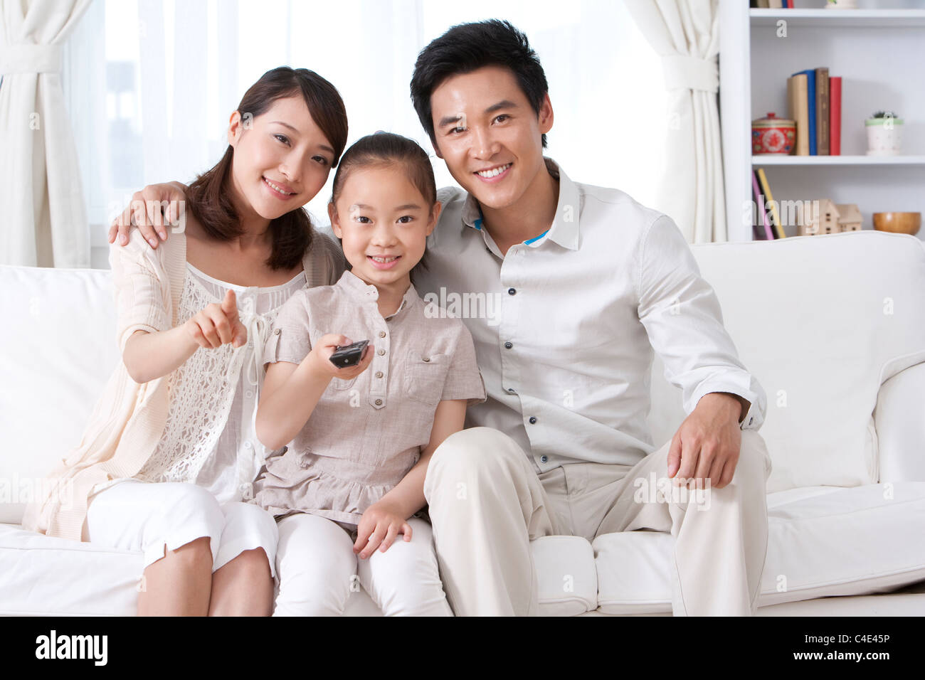 Happy Family Watching TV Stock Photo - Alamy