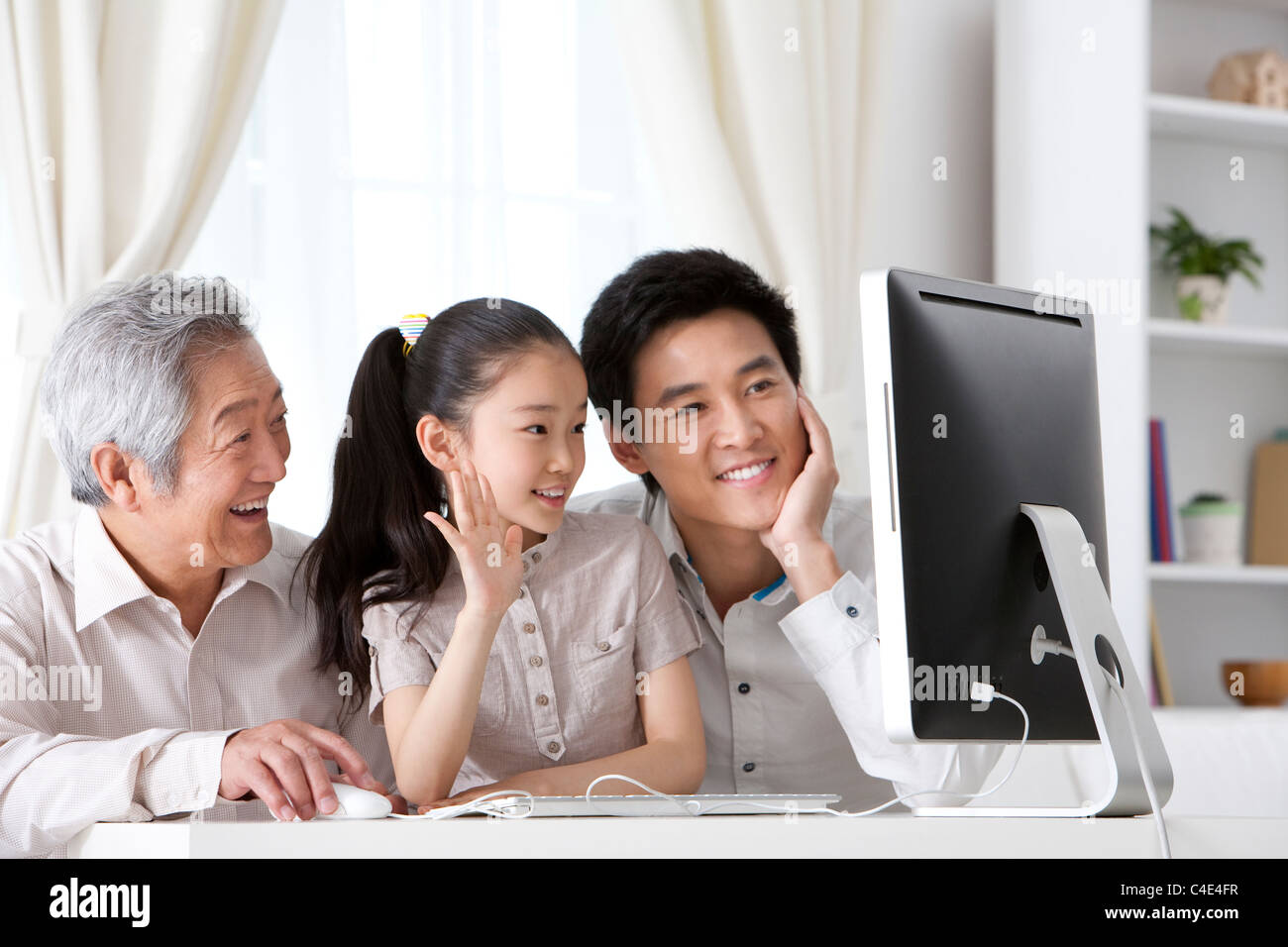 Video chatting with grandchild hi-res stock photography and images - Alamy