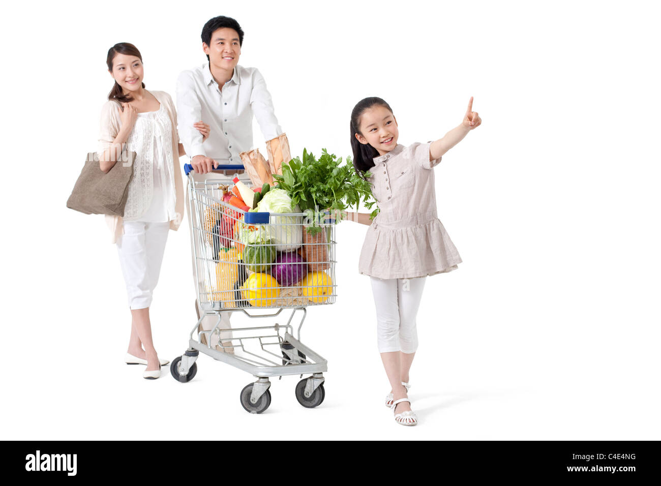 Young Family Grocery Shopping Stock Photo - Alamy