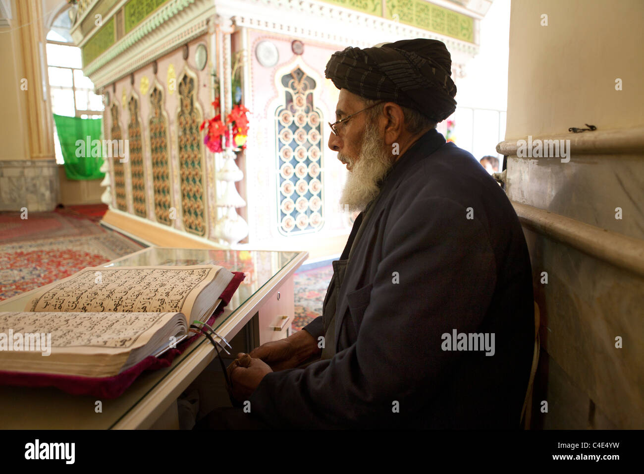 Muslim man reading quran in the mosque hi-res stock photography and ...