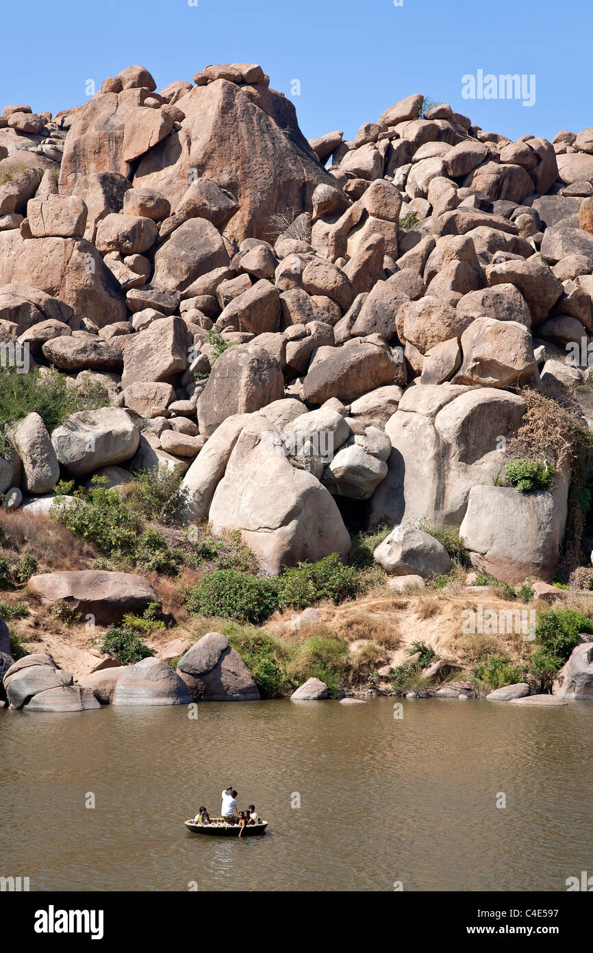 Coracle (traditional bamboo round boat). Tungabhadra river. Hampi ...