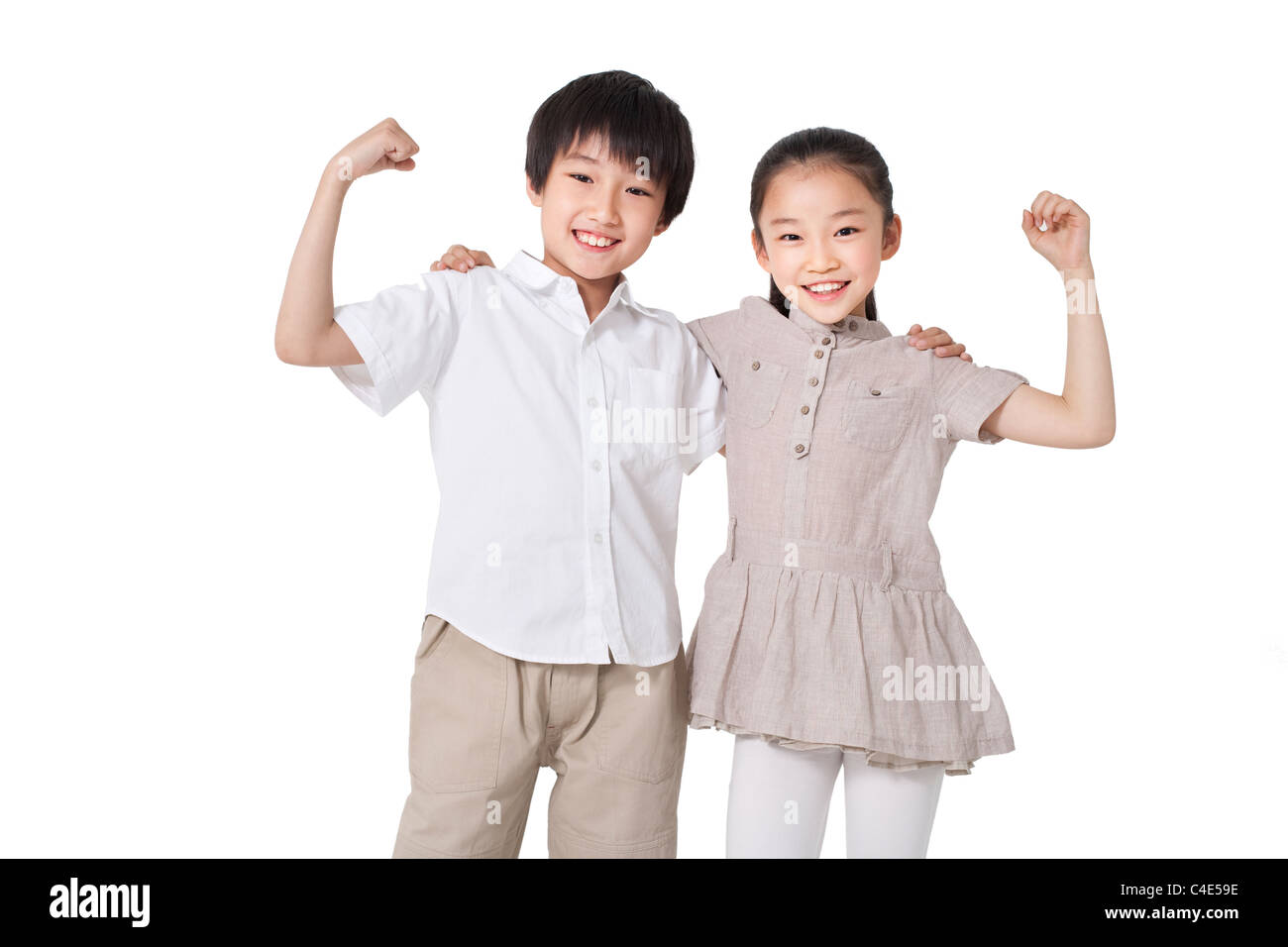 Cheerful girls flexing arm hi-res stock photography and images - Alamy