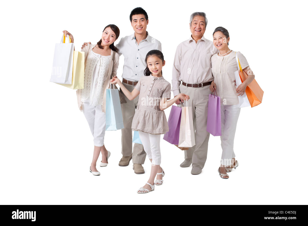 Family Carrying Shopping Bags Stock Photo - Alamy
