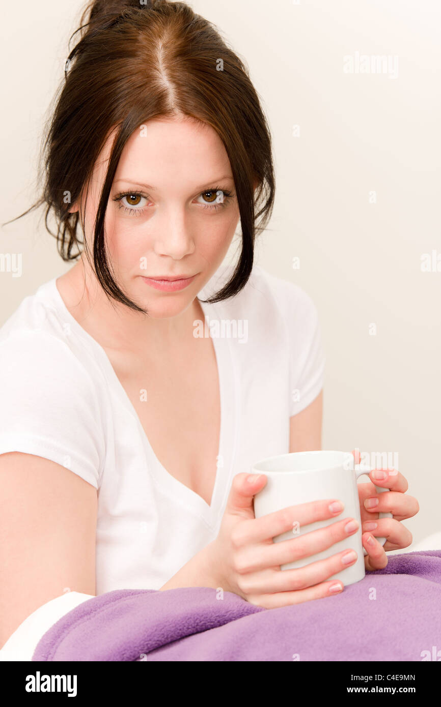 Portrait of young student girl drink coffee in bed Stock Photo - Alamy