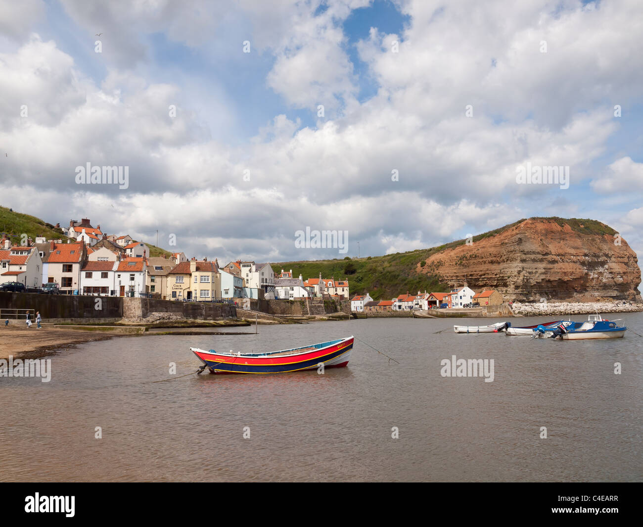 Traditional Yorkshire Coble fishing boat in Staithes harbour North ...