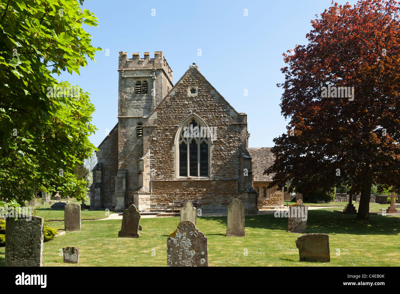St Peter's church in the Cotswold village of Little Rissington ...