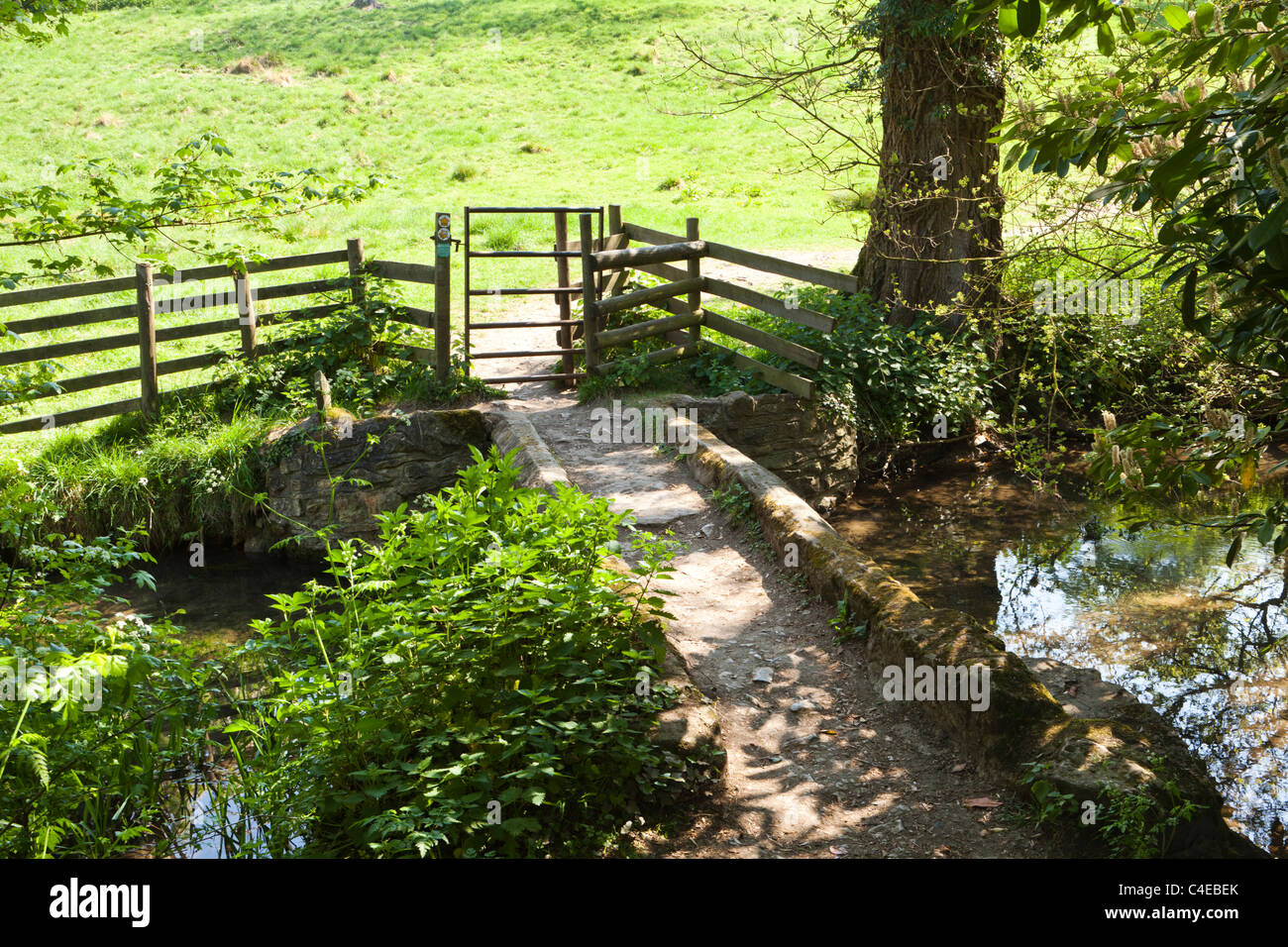 The Windrush Way footpath crossing over the River Eye in the Cotswold ...