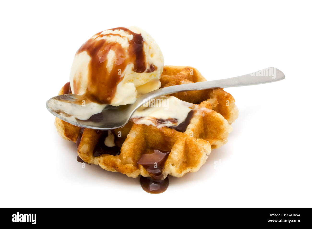 Home made waffle with ice cream and spoon isolated on white Stock Photo ...