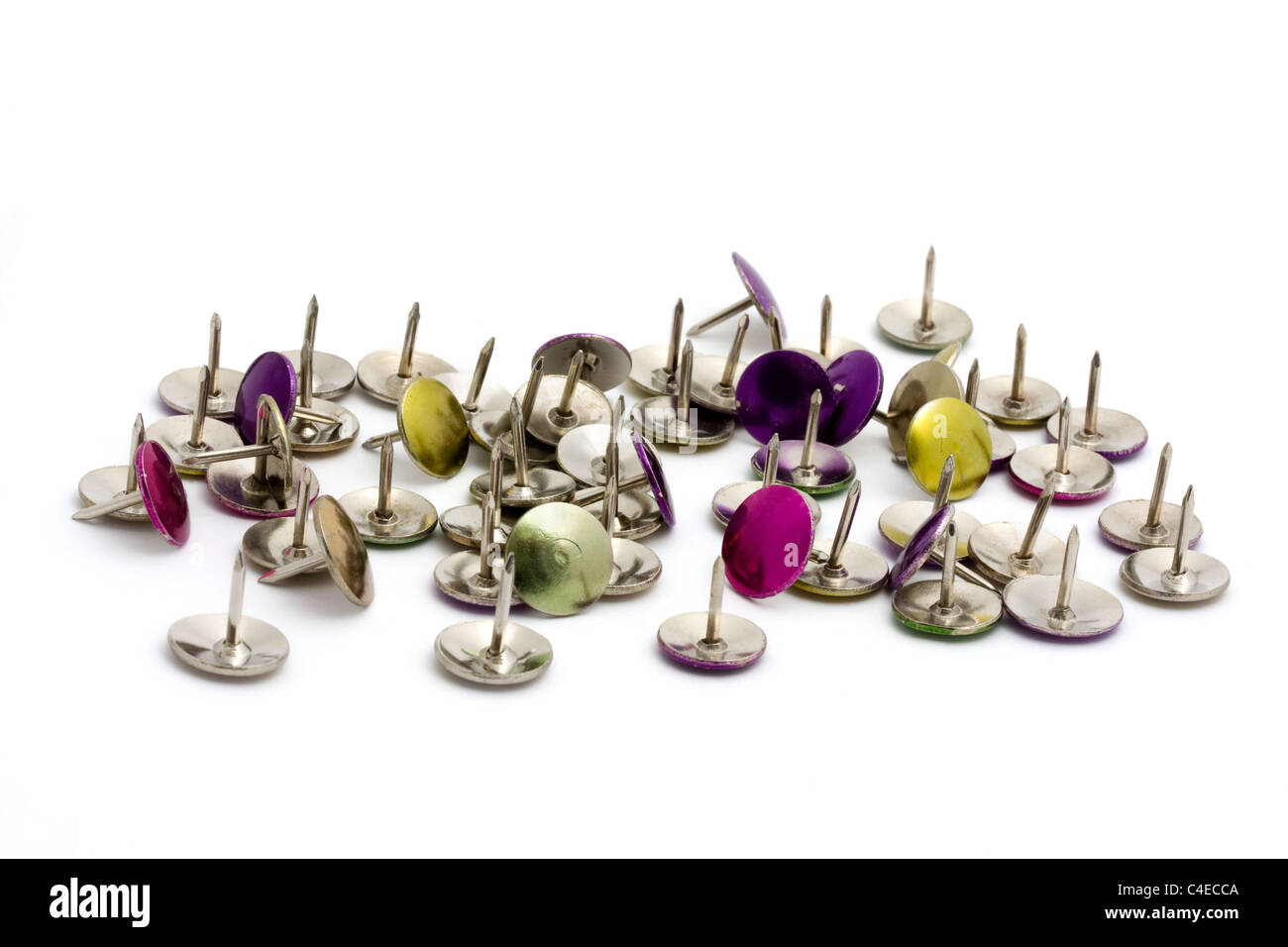 Pile of drawing pins over white Stock Photo - Alamy