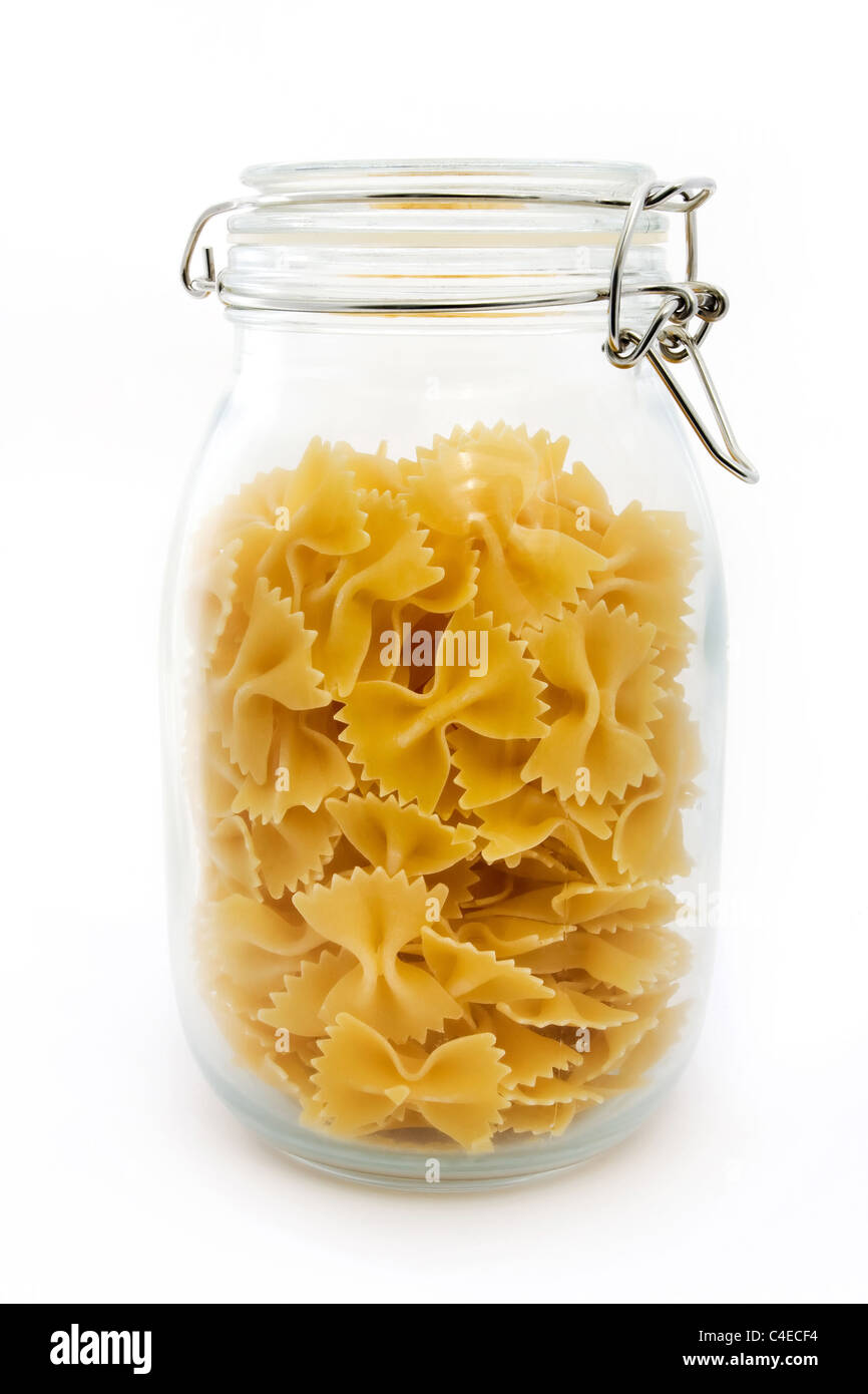 Jar of pasta isolated on white Stock Photo - Alamy
