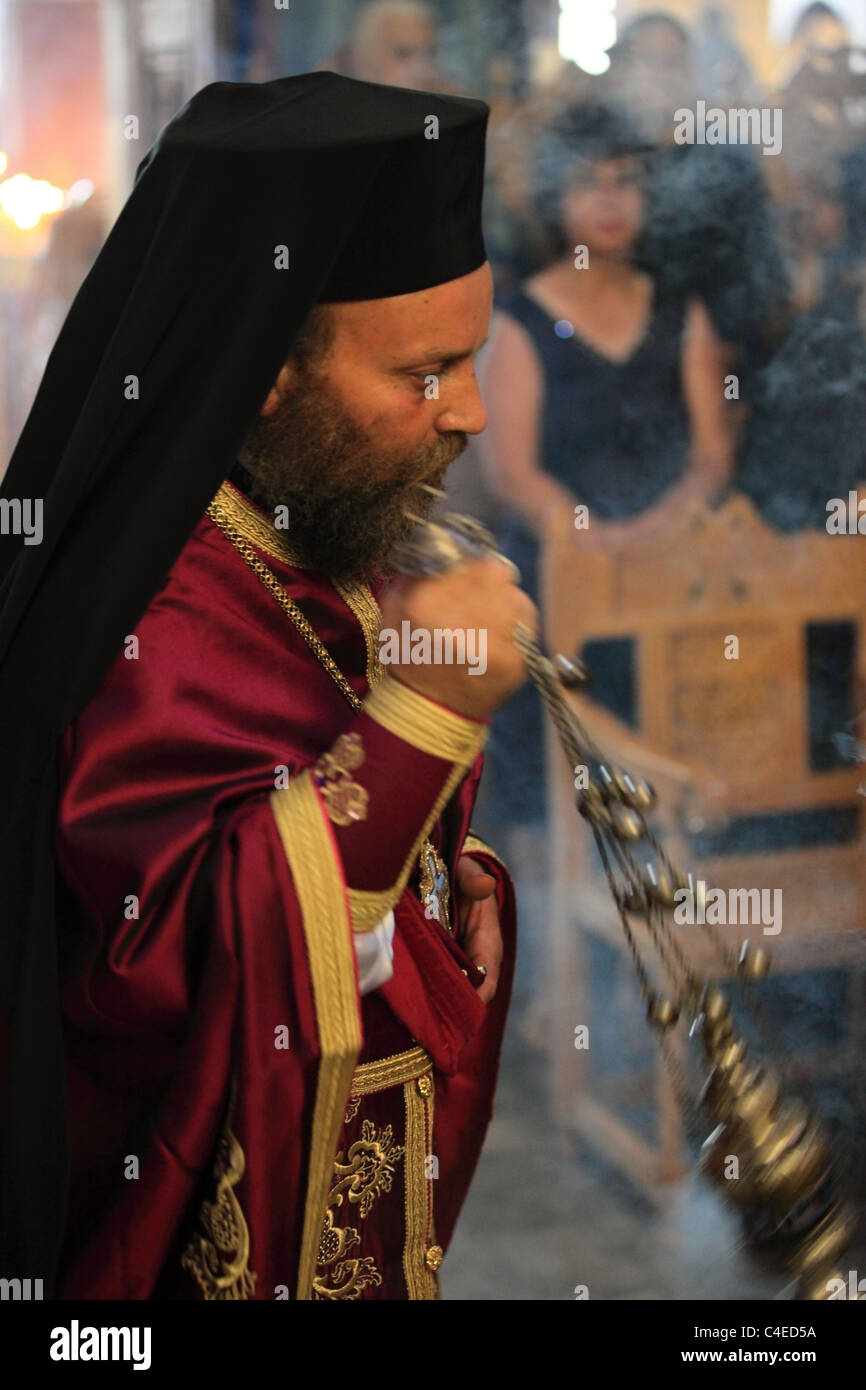Greek priest in a church in Nisyros island Greece Stock Photo - Alamy