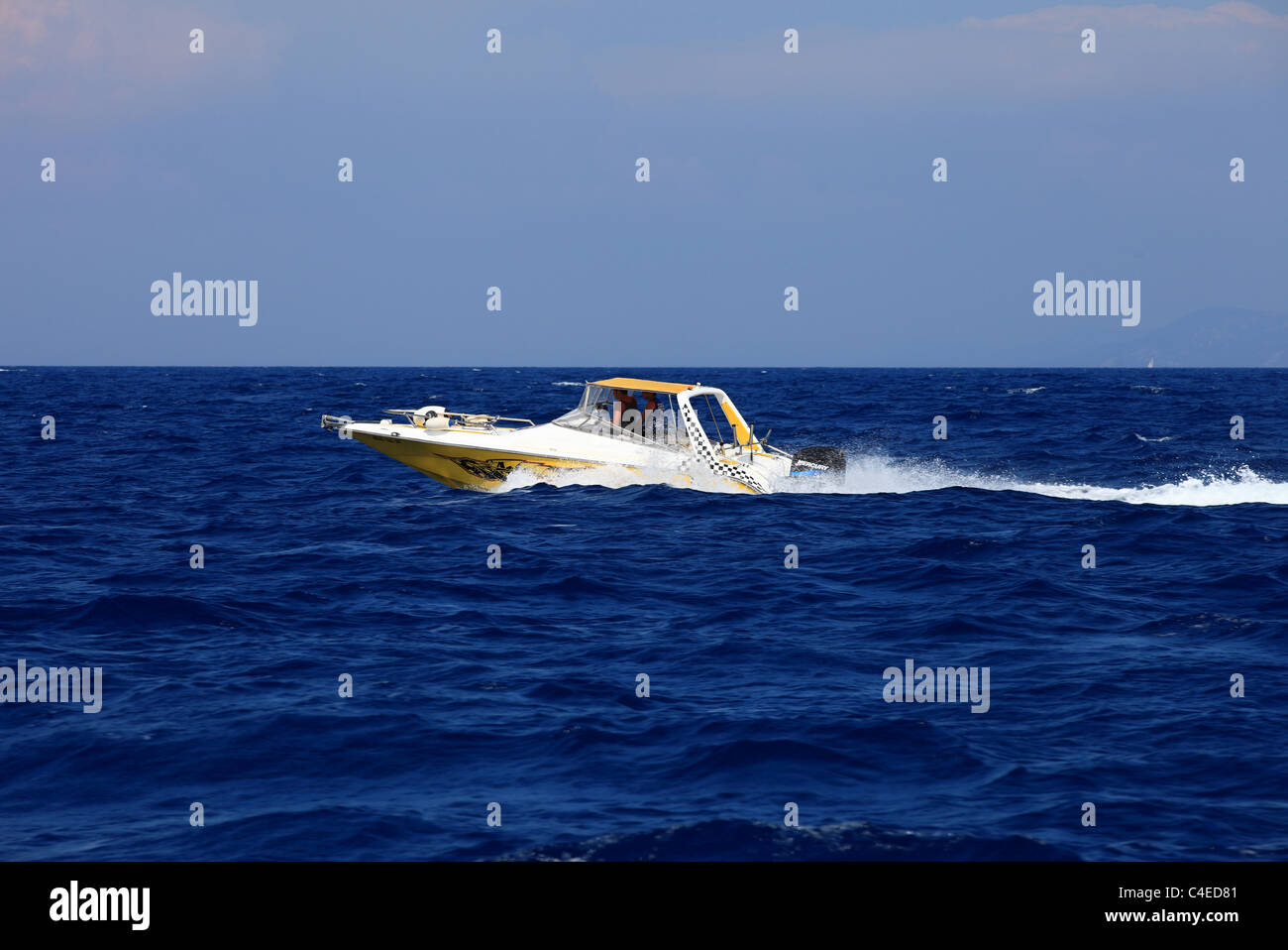 Little speed boat cruising in the Aegean Sea Kos Greece Stock Photo - Alamy