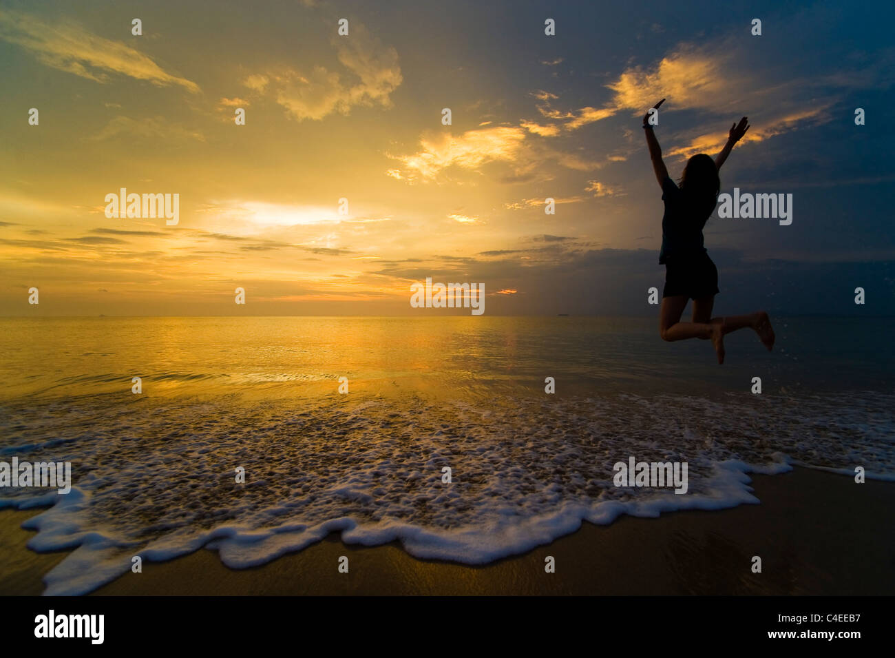 Celebration leaping jumping winner hi-res stock photography and images ...