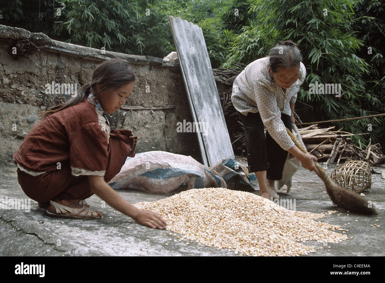 rural village scene selling grains Stock Photo - Alamy