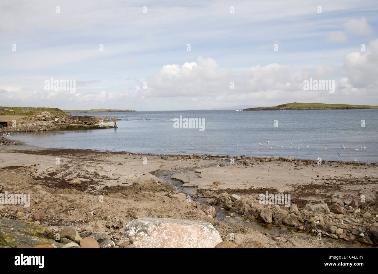 Shetland Isles The sandy beach and landing stage of Ness of Melby Stock ...