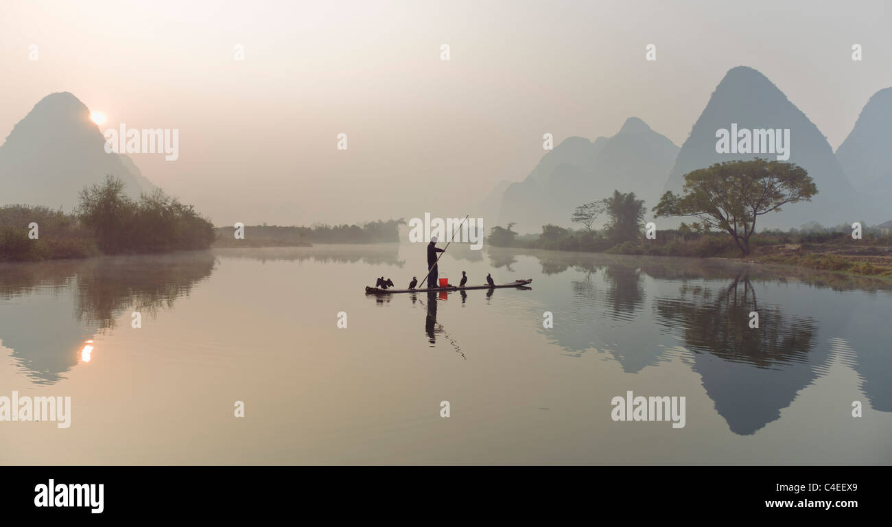 Cormorant fishing on the Yulong River. south of Guilin, Guangxi, China ...