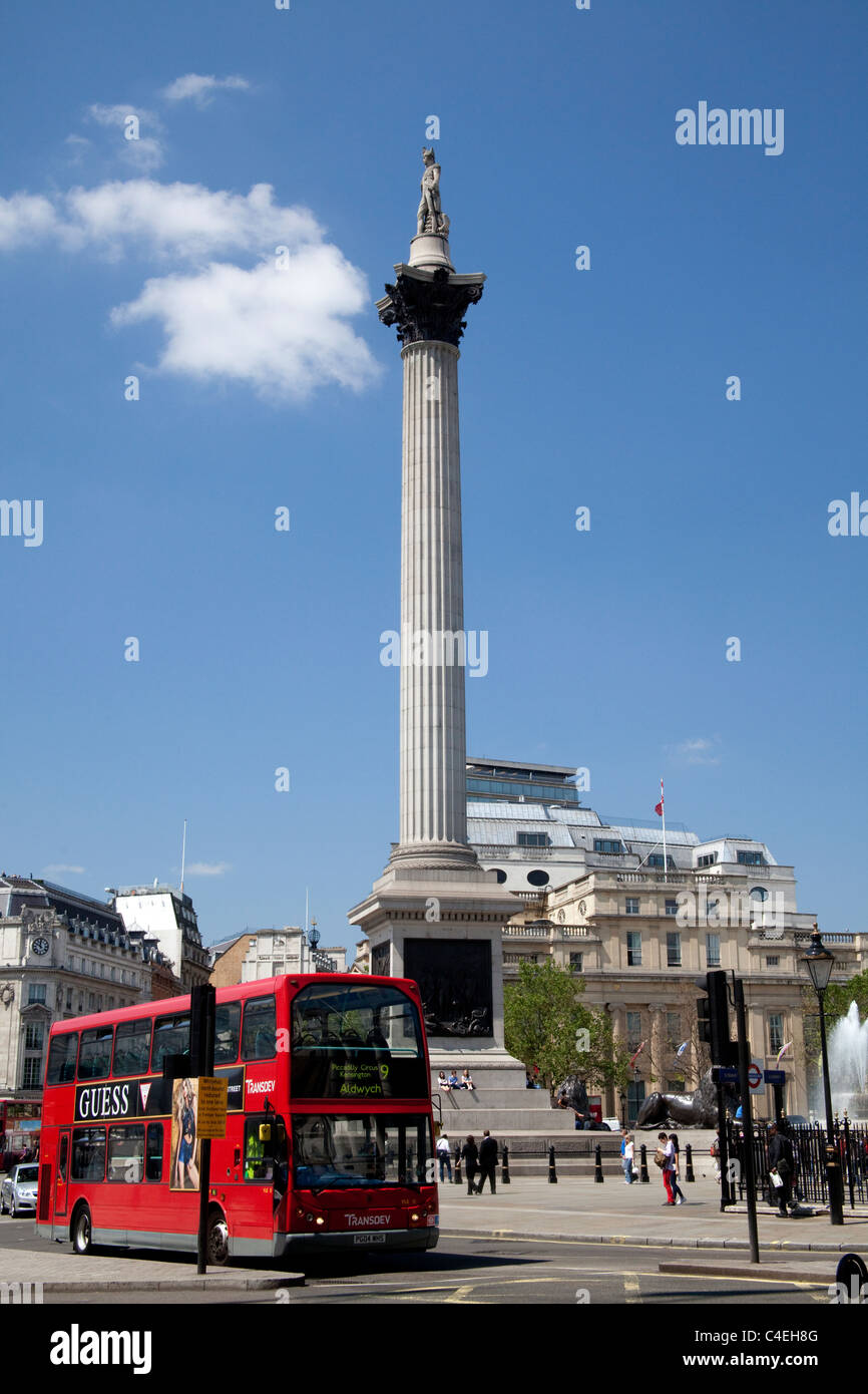 Trafalgar Square, London bus and Nelson's Column Stock Photo - Alamy