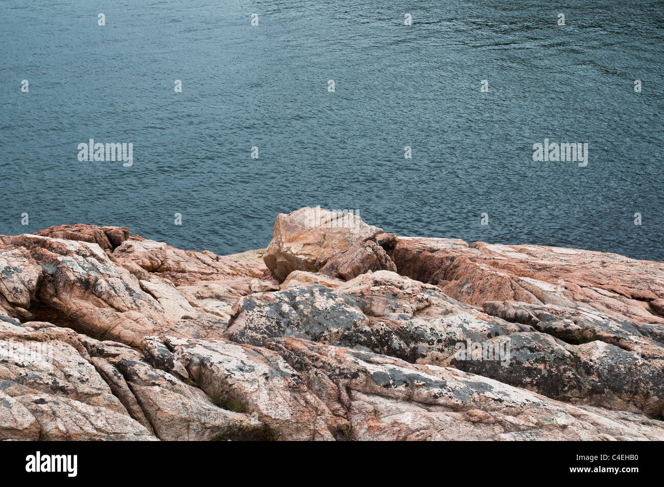 Pink granite at the water's edge in Acadia National Park on Mount ...