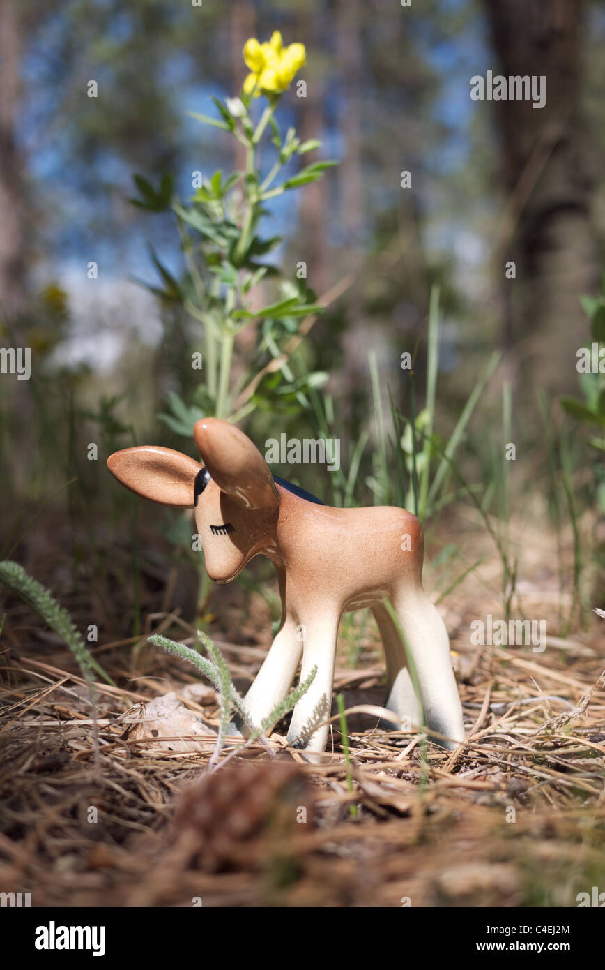 SMALL CERAMIC DONKEY FIGURINE IN WOODS Stock Photo - Alamy