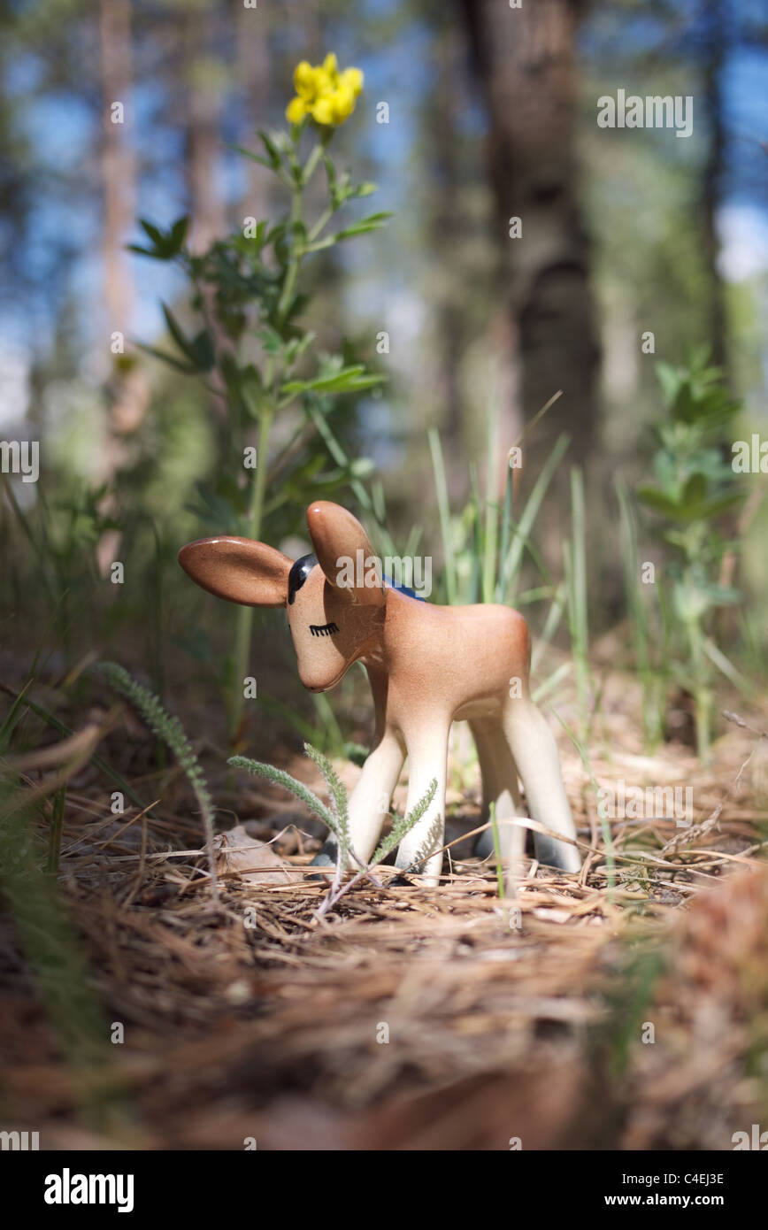 SMALL CERAMIC DONKEY FIGURINE IN WOODS Stock Photo - Alamy