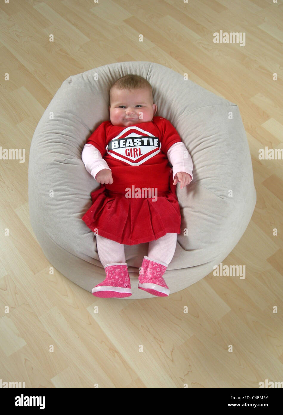 Five month old baby girl wearing tee shirt with the words "Beastie Girl ...