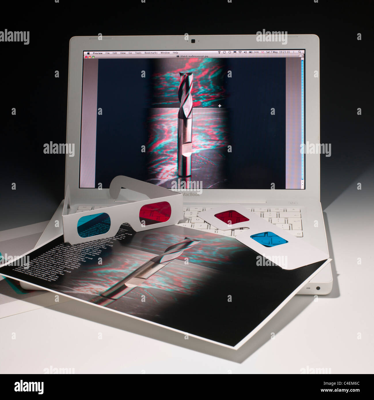 3D photo with red-blue viewing specs shown on a laptop screen and a ...
