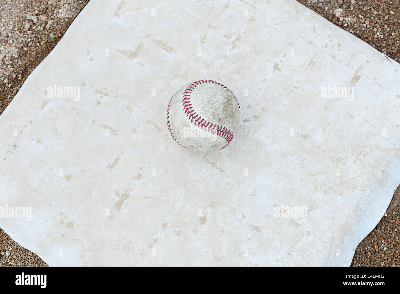 An old worn baseball on a baseball field Stock Photo - Alamy