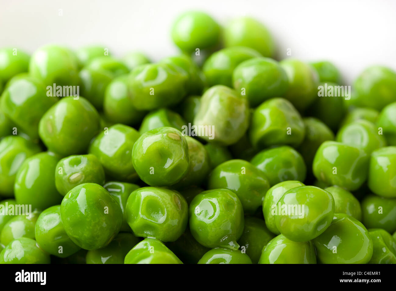 Fresh green peas being washed with water Stock Photo - Alamy