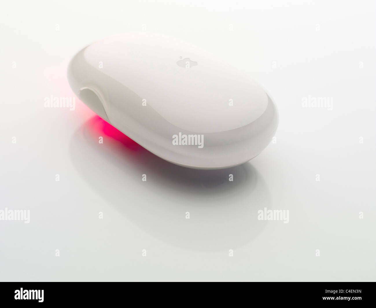 Apple optic mouse on white background Stock Photo - Alamy