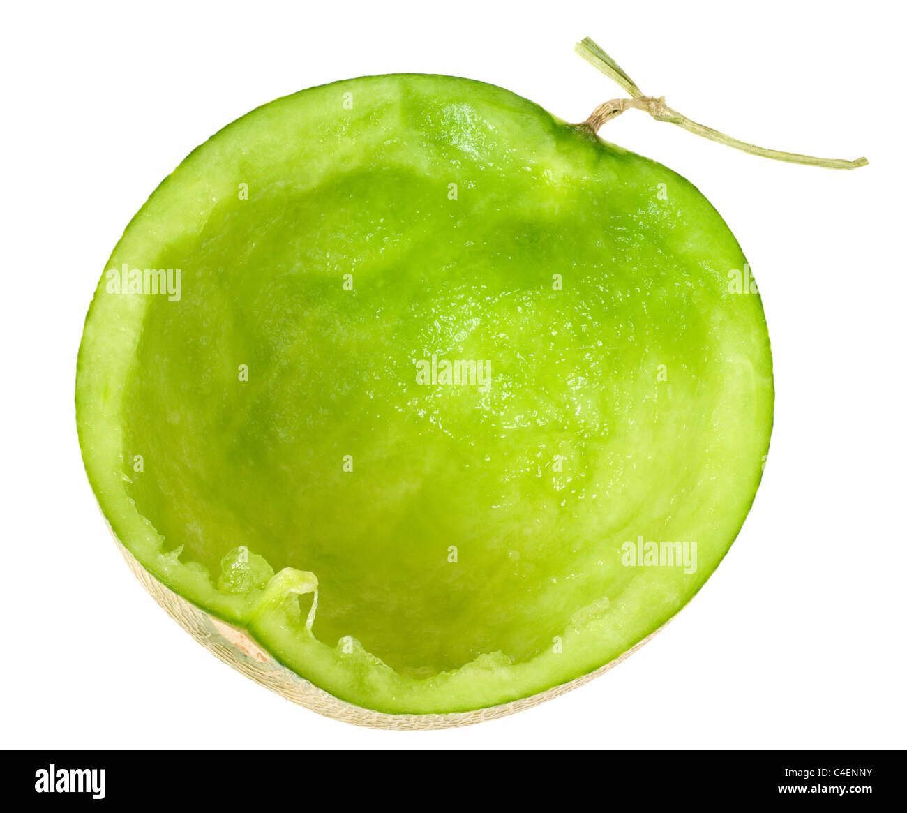 Musk melon left with skin isolated on white background Stock Photo - Alamy