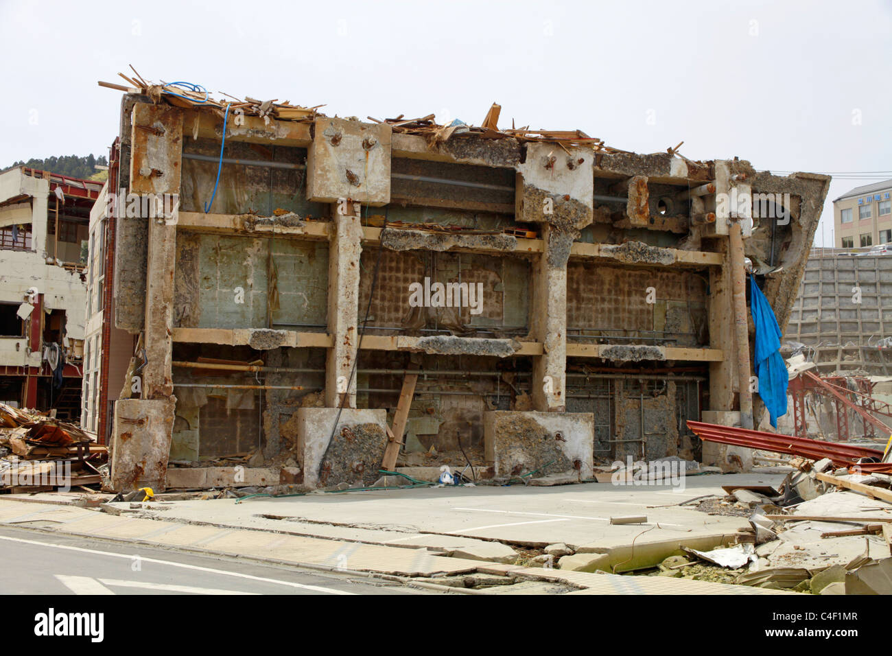 Building knocked over tsunami onagawa hi-res stock photography and ...