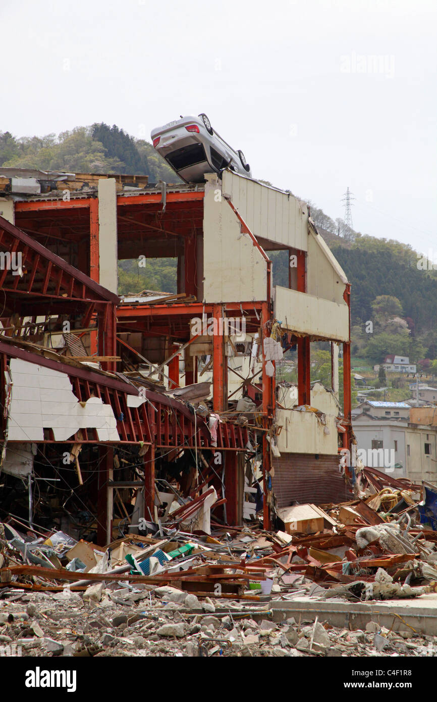 A car left on top of a building after tsunami wave gone Onagawa town ...