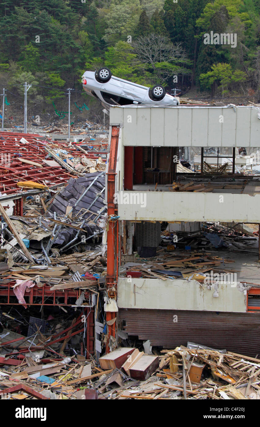 A car left on top of a building after tsunami wave gone Onagawa town ...