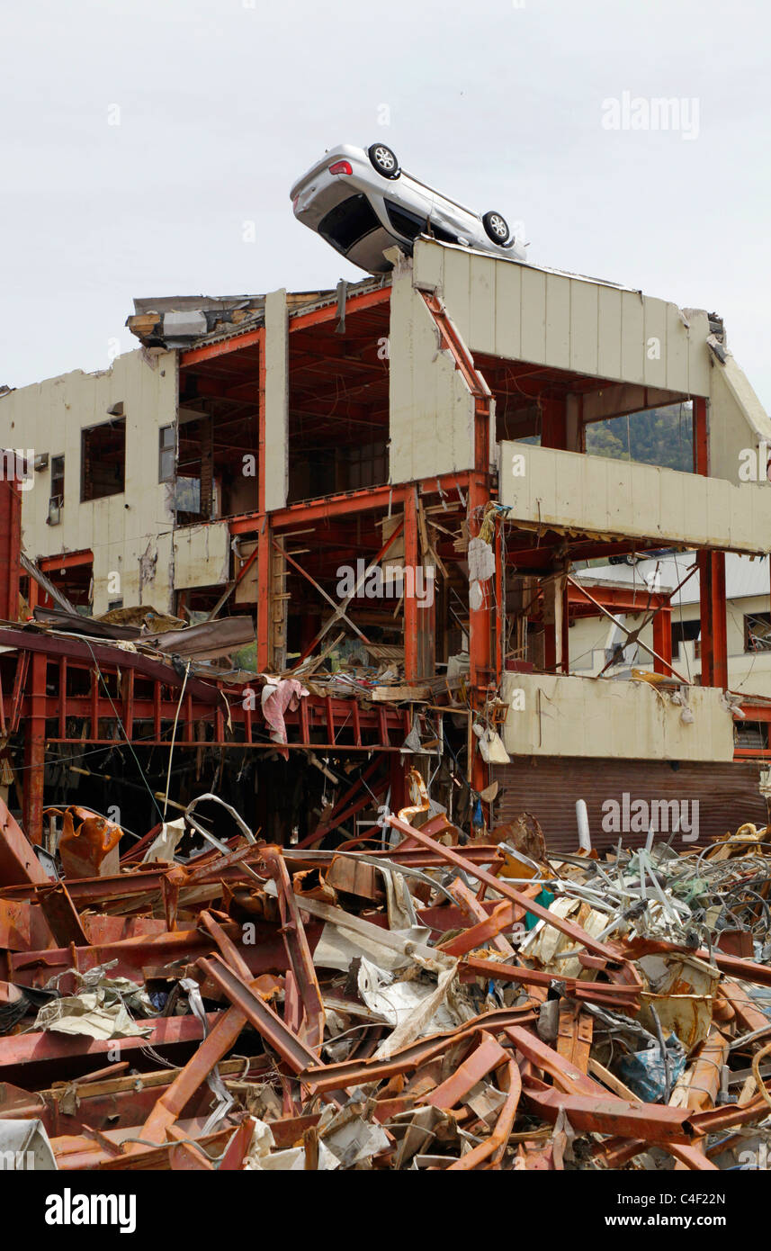 A car left on top of a building after tsunami wave gone Onagawa town ...
