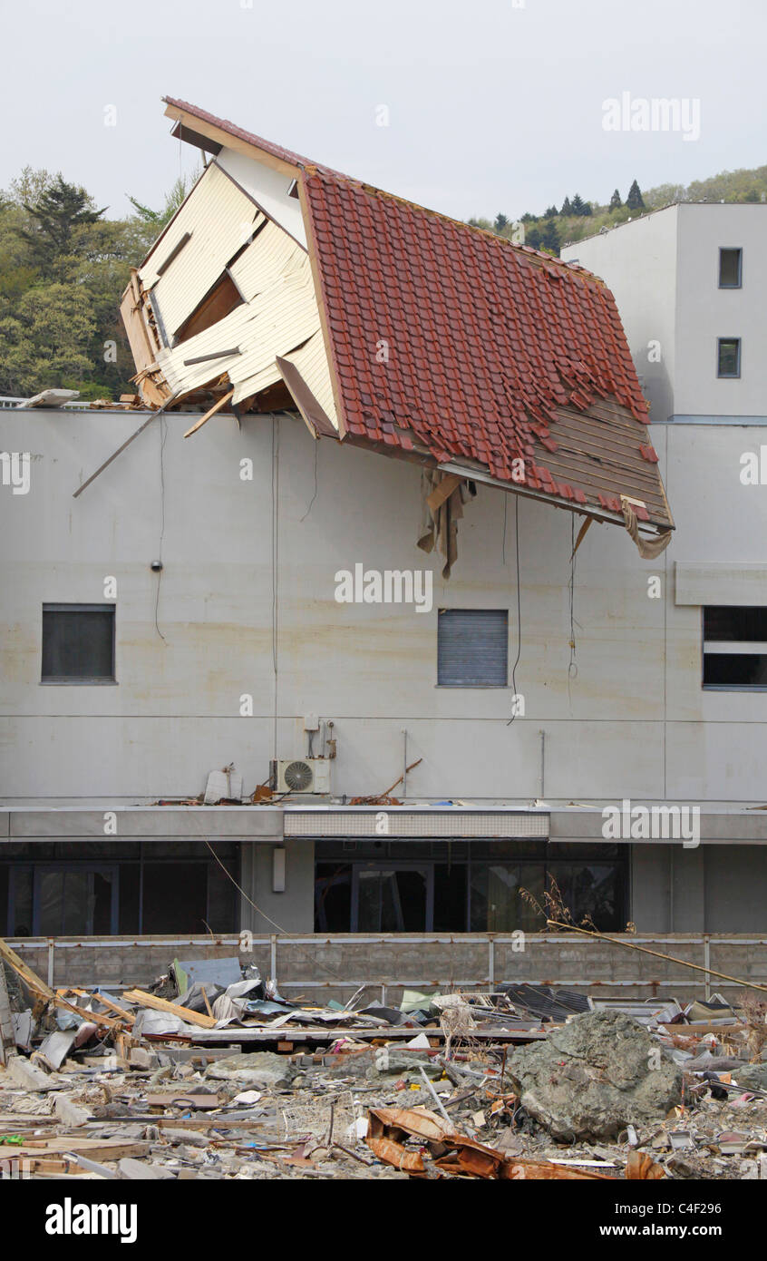 A house left on top of a building after tsunami wave gone Onagawa town ...