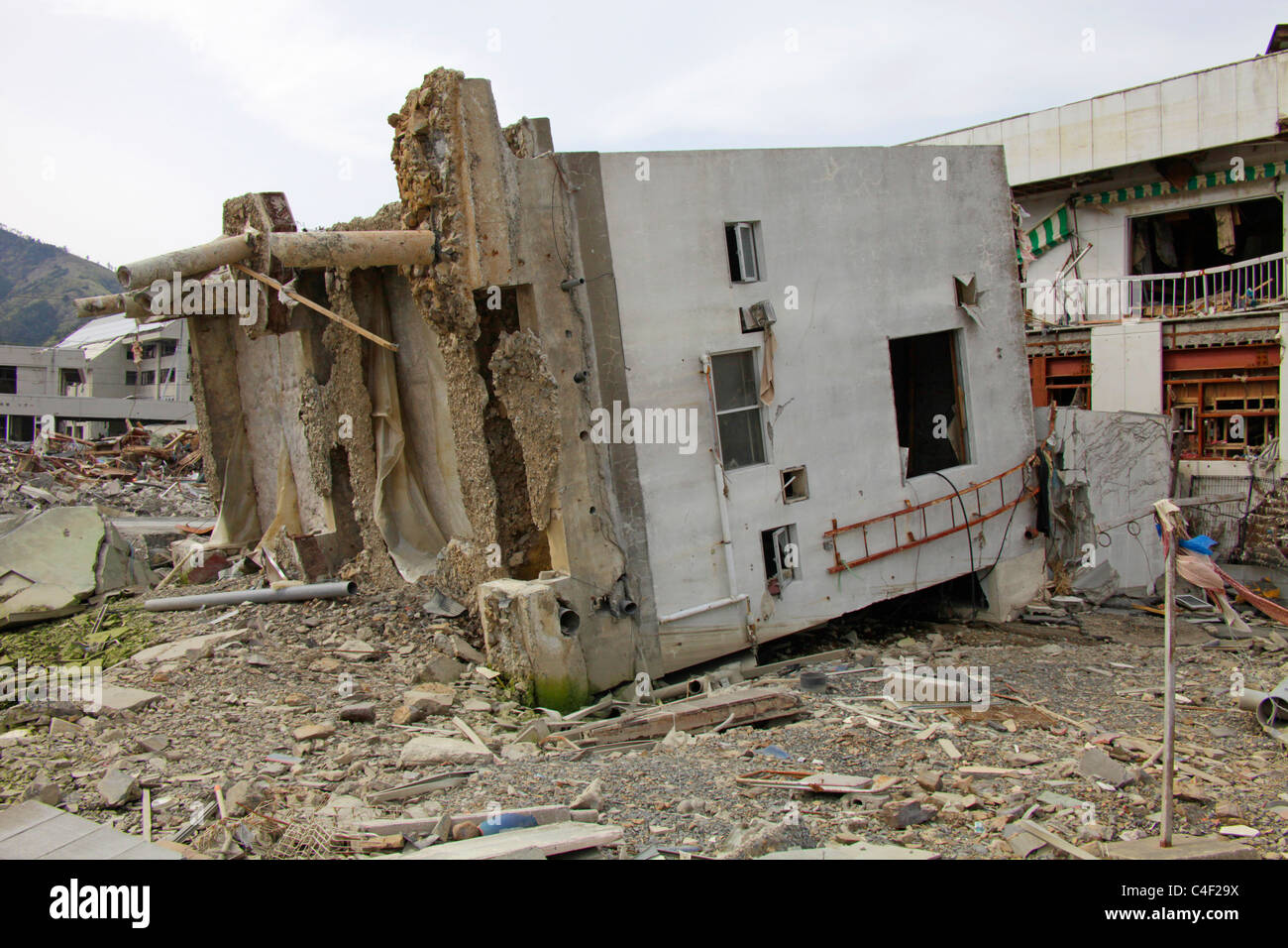 A building knocked over tsunami at Onagawa Miyagi Japan Stock Photo - Alamy