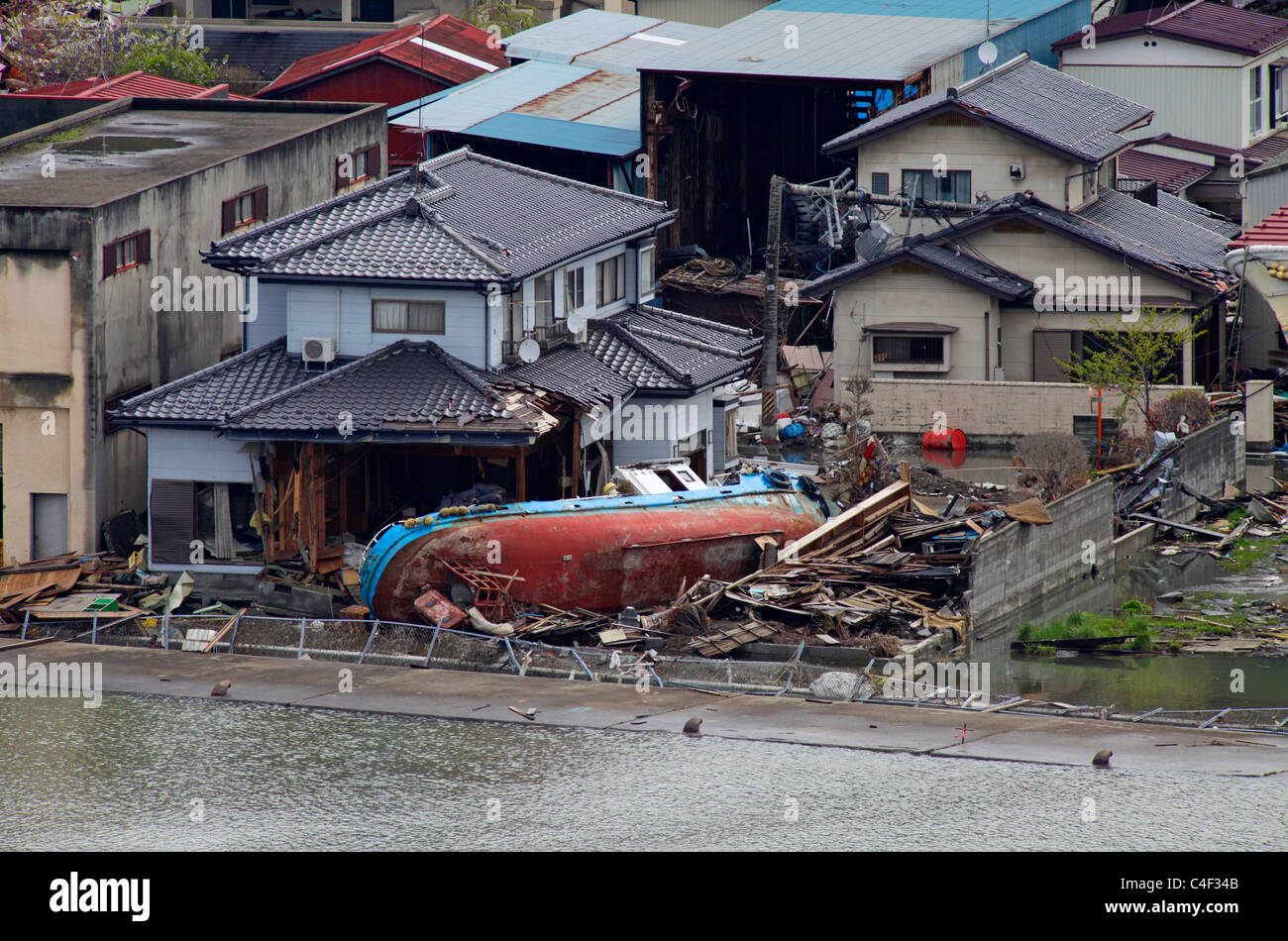 A fishing boat tossed ashore by tsunami Ishinomaki Miyagi Japan Stock ...
