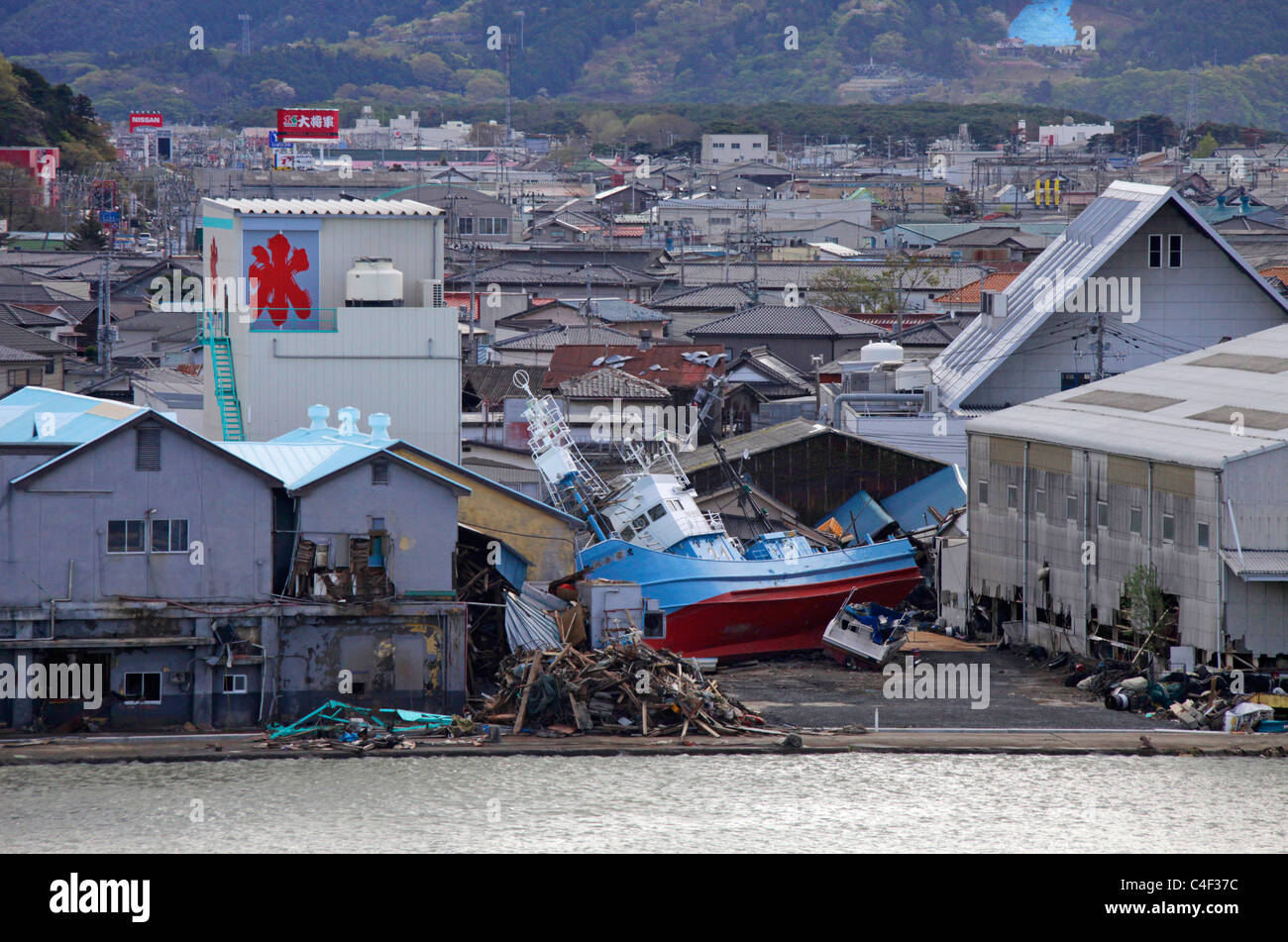A fishing boat tossed ashore by tsunami Ishinomaki Miyagi Japan Stock ...