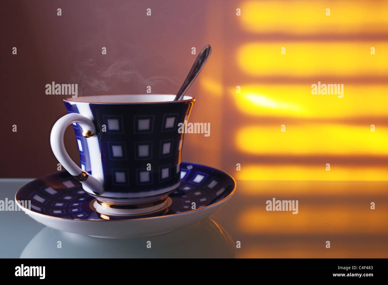 coffee on a glass table Stock Photo - Alamy