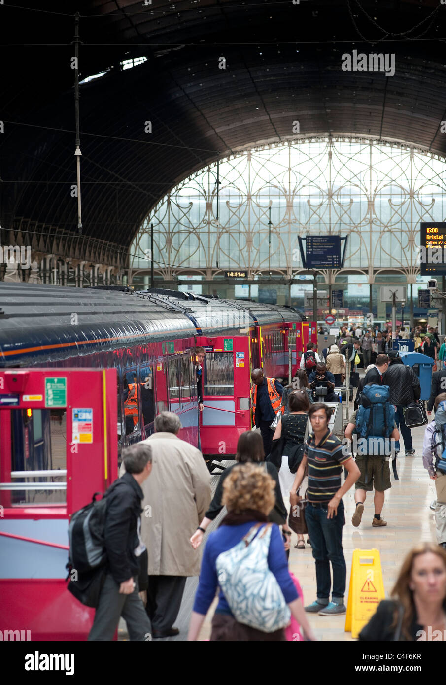 Passengers getting off of a train at Paddington station, London ...