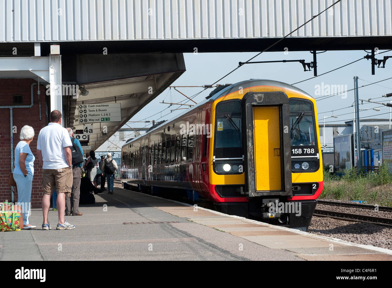 Class 158 passenger train in East Midlands Trains livery waiting at a ...