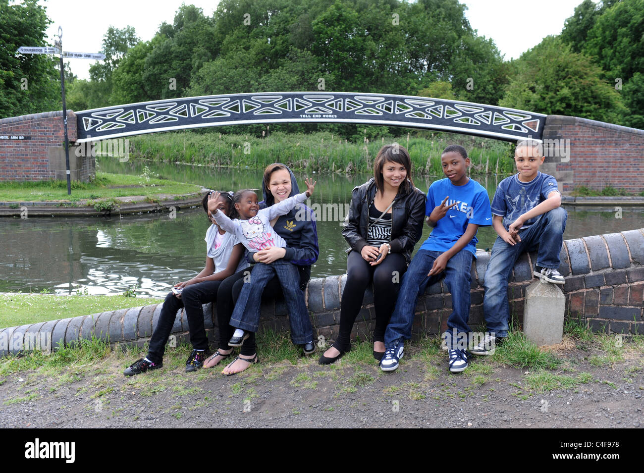 Children playing by the canal at Netherton West Midlands England Uk ...