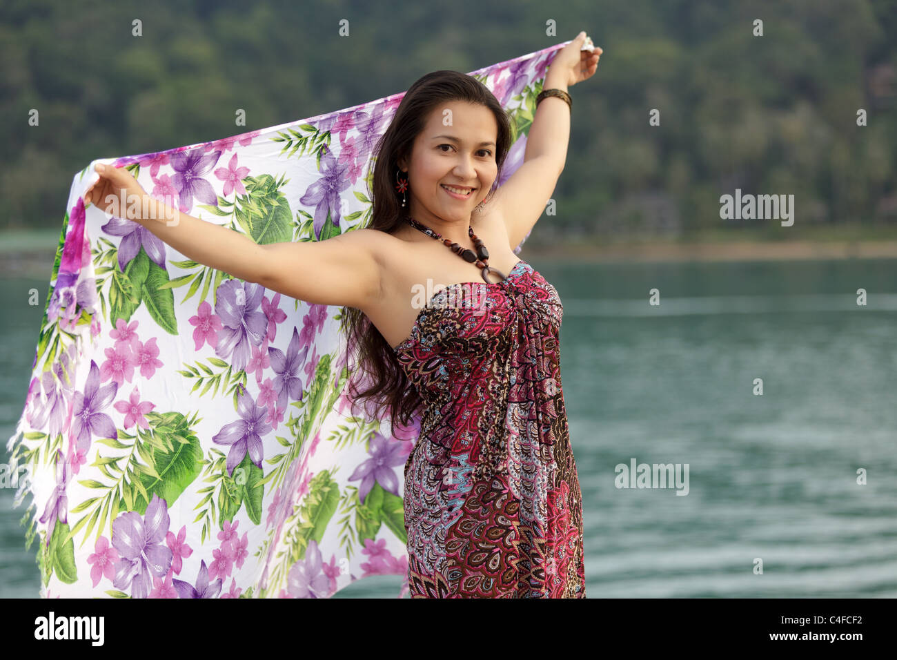 asian woman holding sarong at the sea, Ko Chang, thailand Stock Photo ...