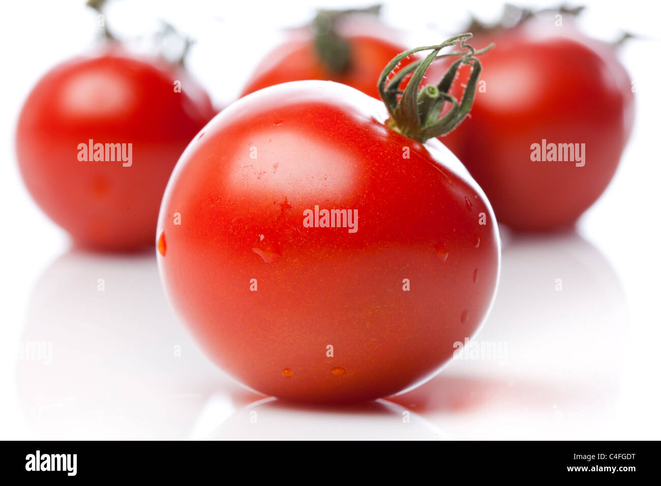 Shiny red tomatoes hi-res stock photography and images - Alamy