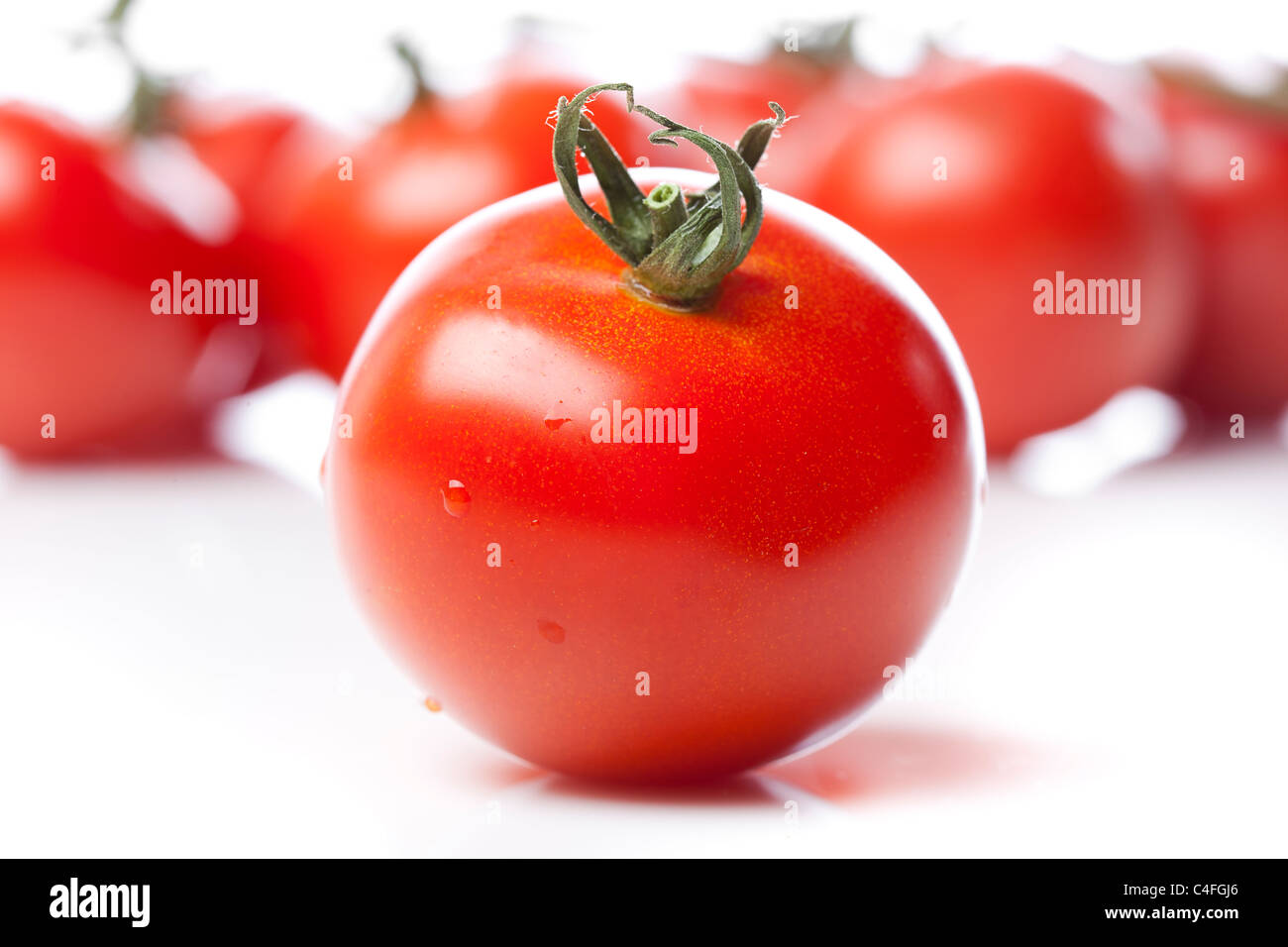 Shiny red tomatoes hi-res stock photography and images - Alamy