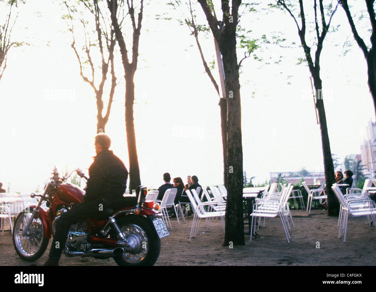Motorcycle driver takes a break Stock Photo - Alamy