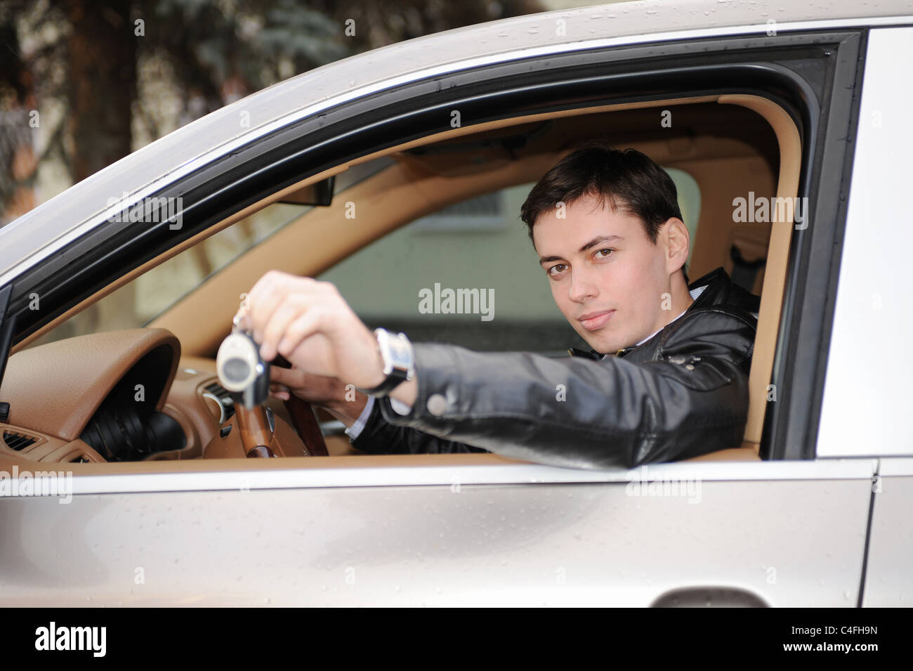 man showing the keys Stock Photo - Alamy