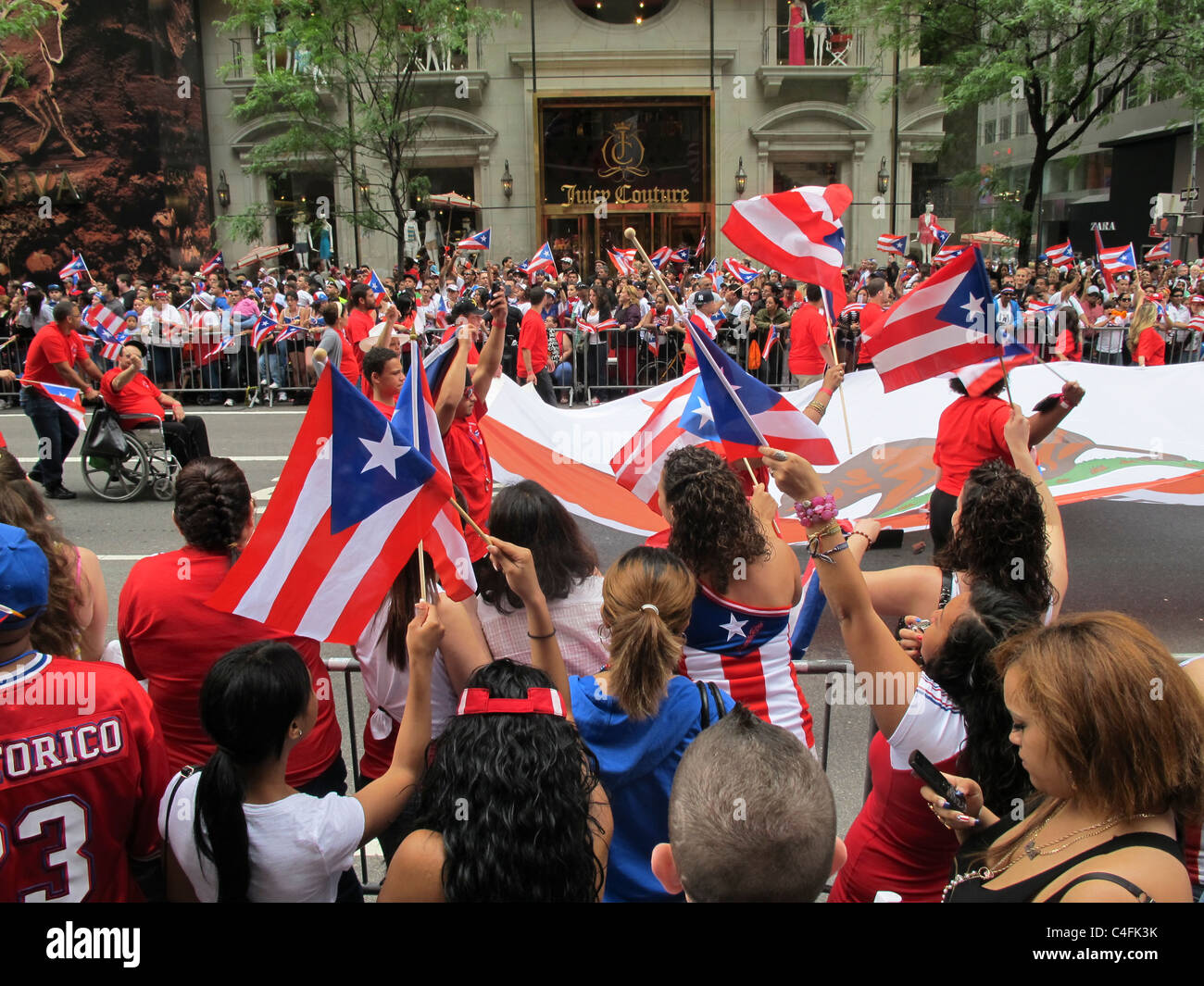 Spectators line Fifth Avenue for the 54th annual Puerto Rican Day ...
